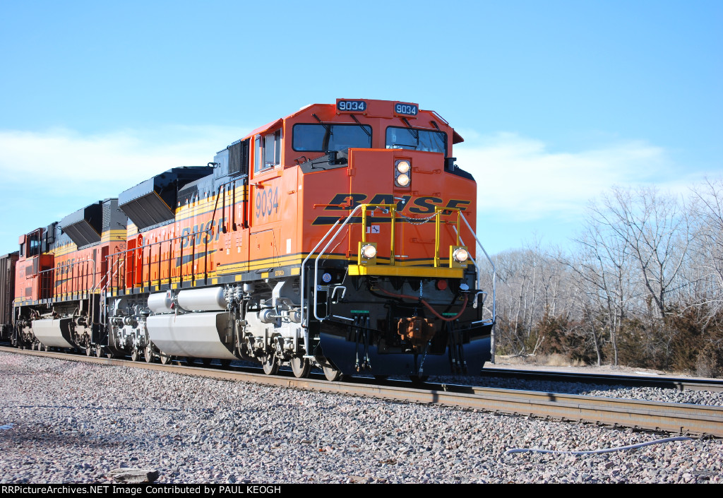 BNSF 9034 Heads eastbound into the BNSF Lincoln yard pulling a loaded Coal.